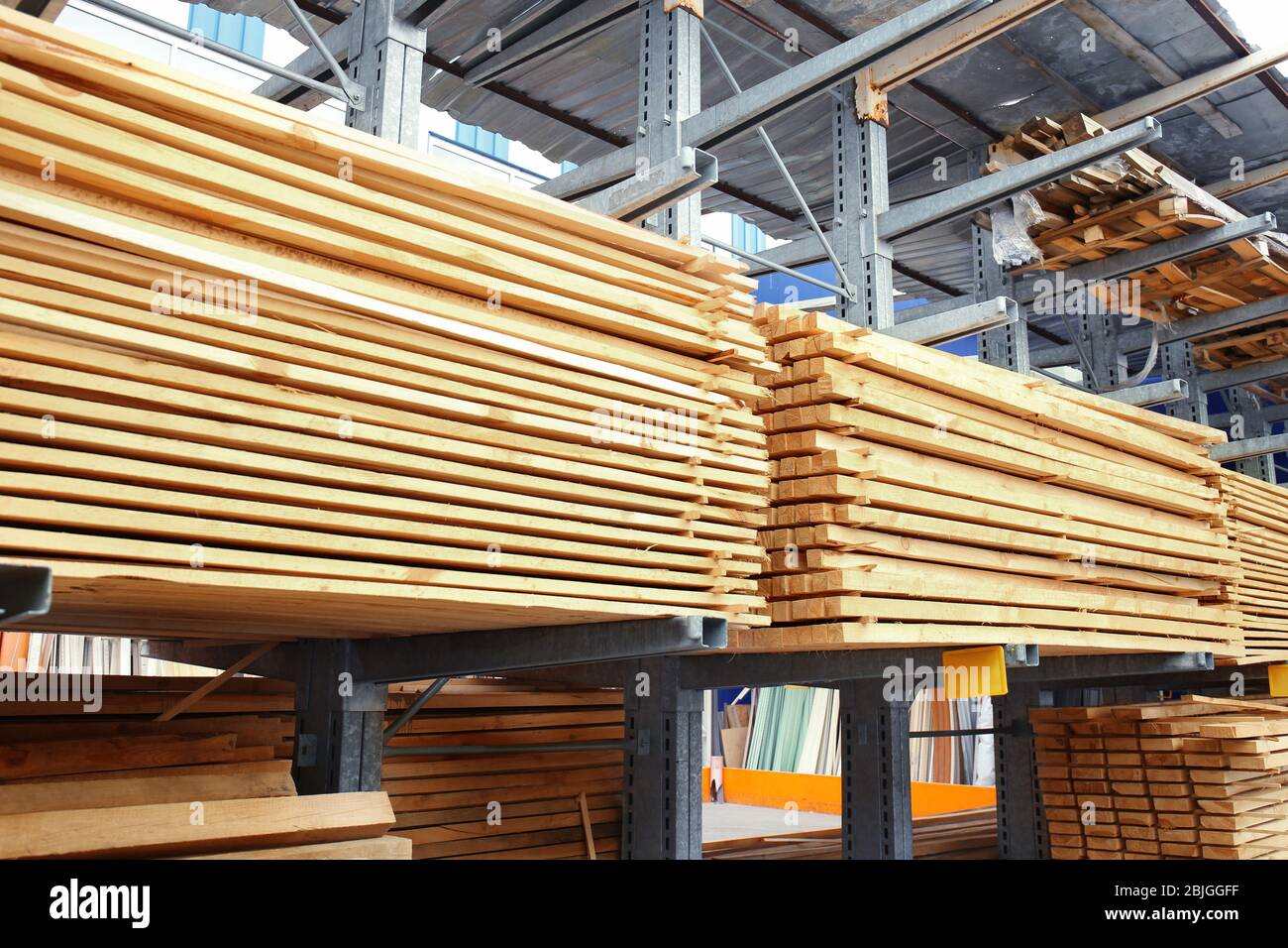 Many wooden planks in hardware store Stock Photo - Alamy