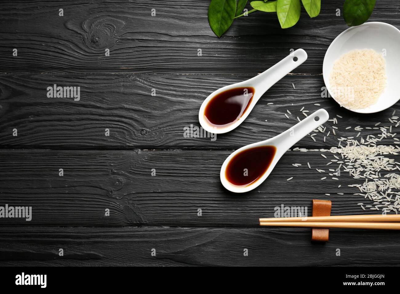 Composition with tasty soy sauce on wooden background Stock Photo - Alamy