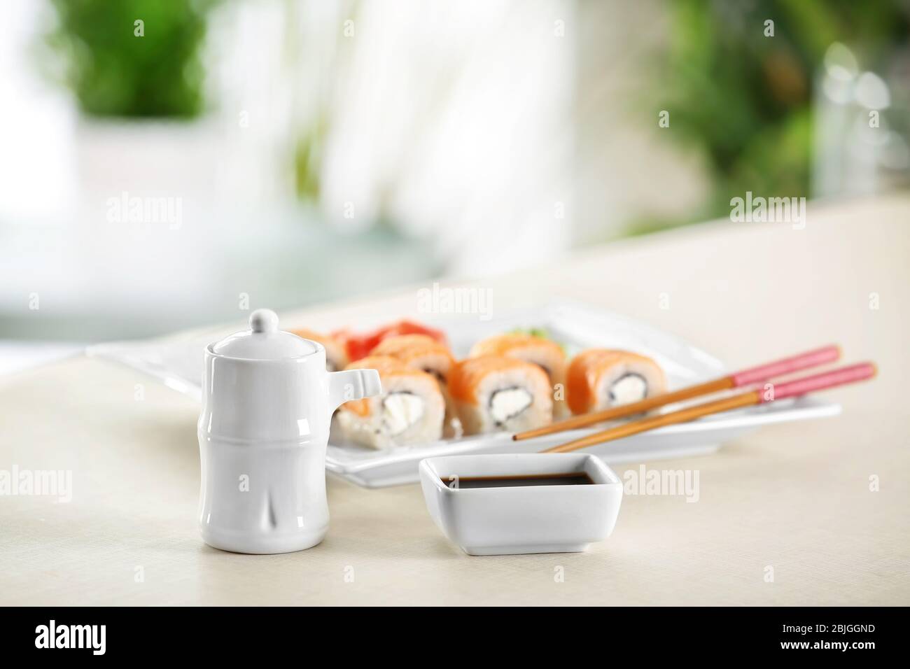 Composition with tasty soy sauce on table Stock Photo - Alamy