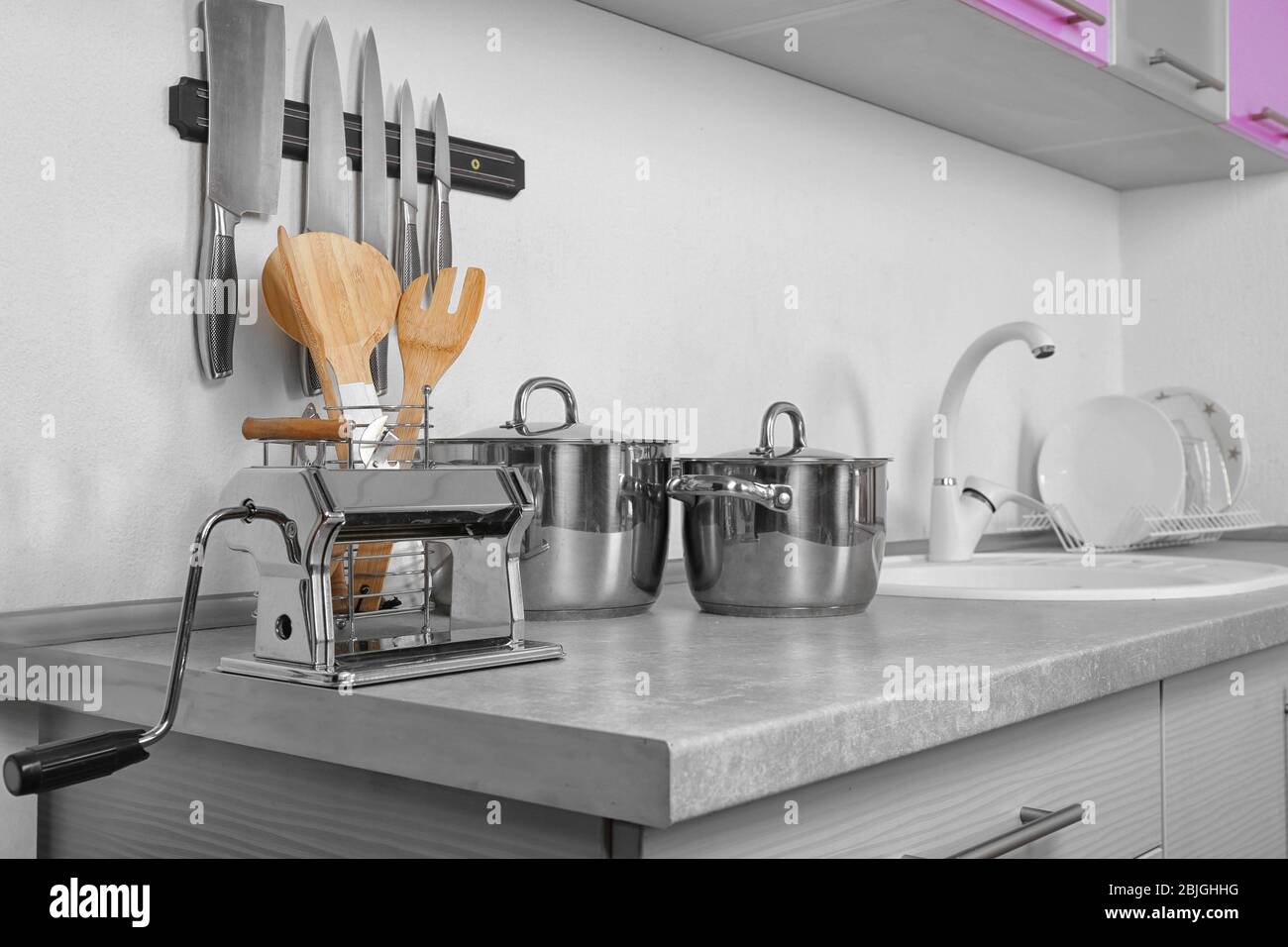 Different utensils in modern kitchen Stock Photo - Alamy