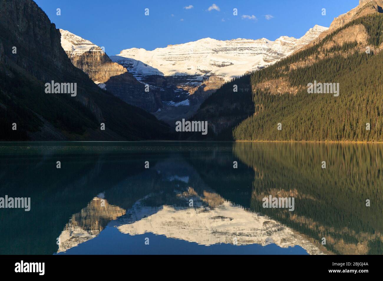 Lake Louise reflections of Victoria Glacier and Fairfax Mountain in ...