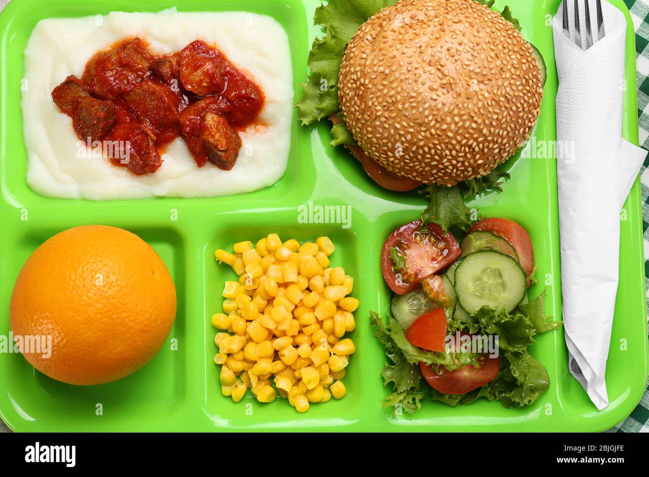 Serving tray with delicious food, closeup. Concept of school lunch Stock Photo - Alamy