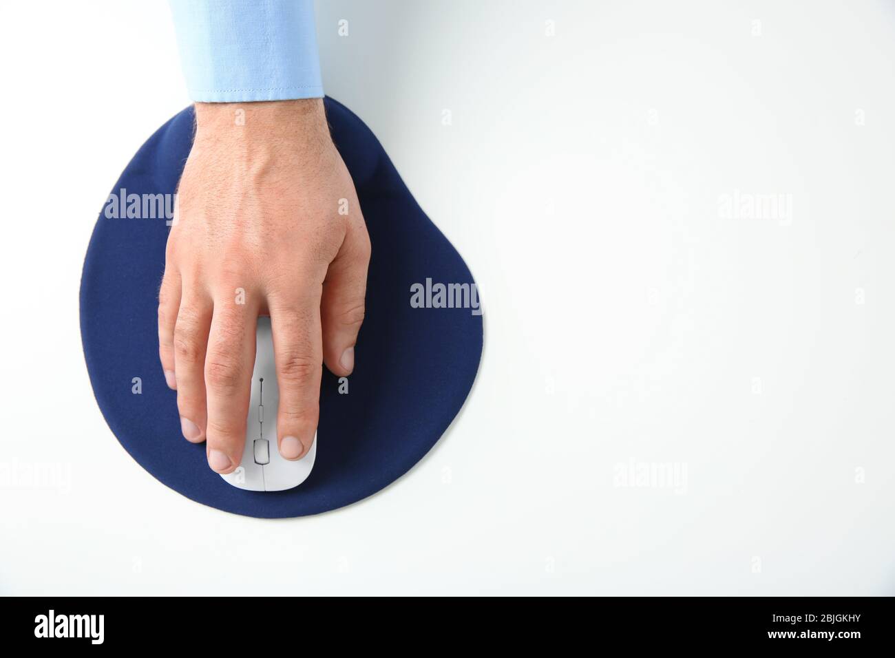 Male hand with computer mouse and pad on white background Stock Photo ...