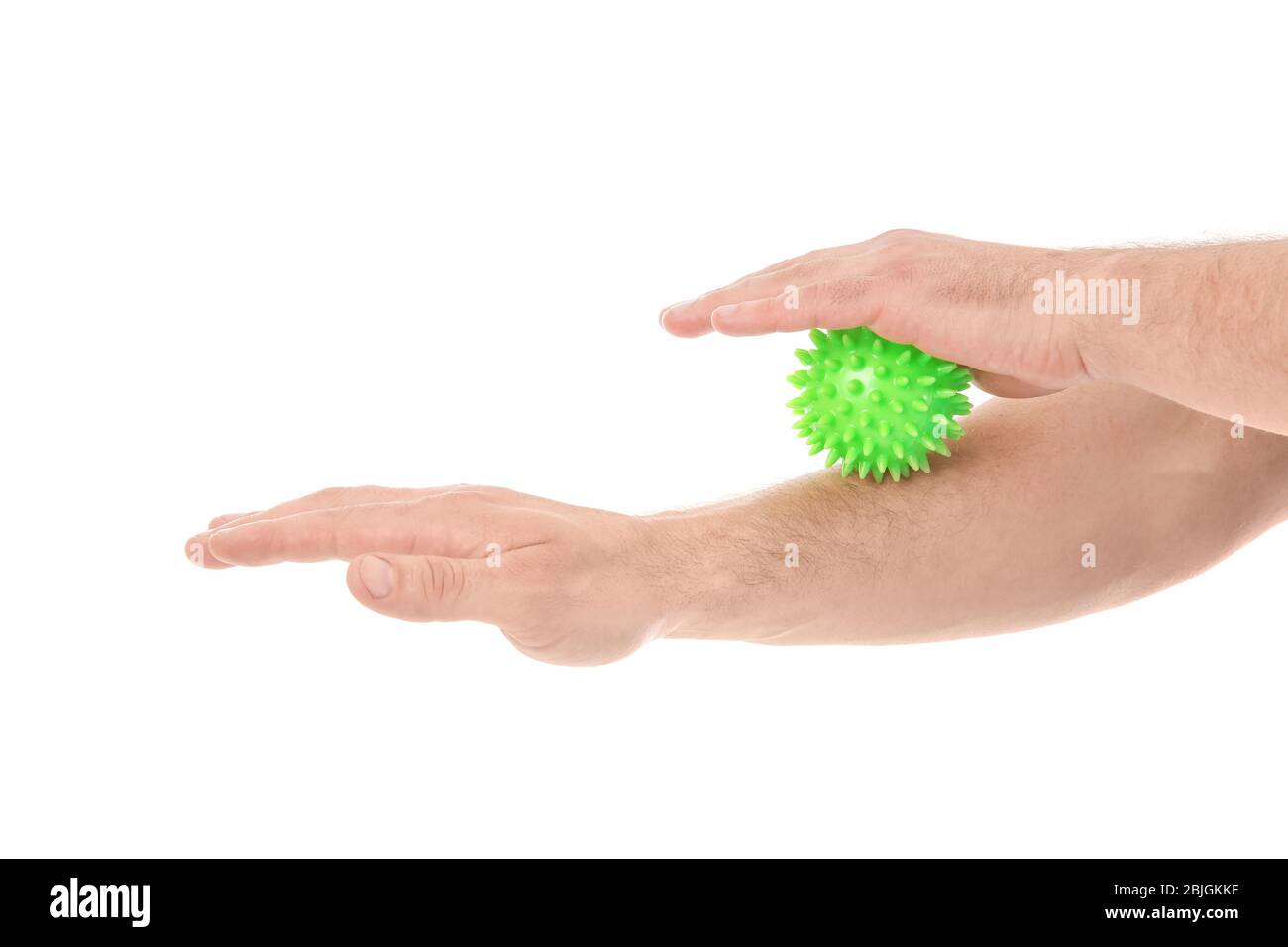 Hands of man doing exercises with rubber ball on white background Stock ...