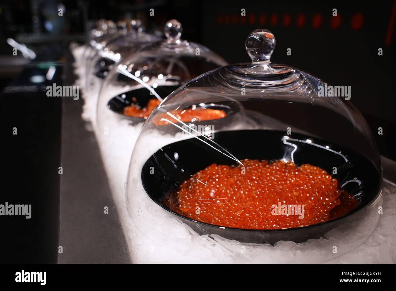 Fresh red caviar in fish supermarket Stock Photo - Alamy