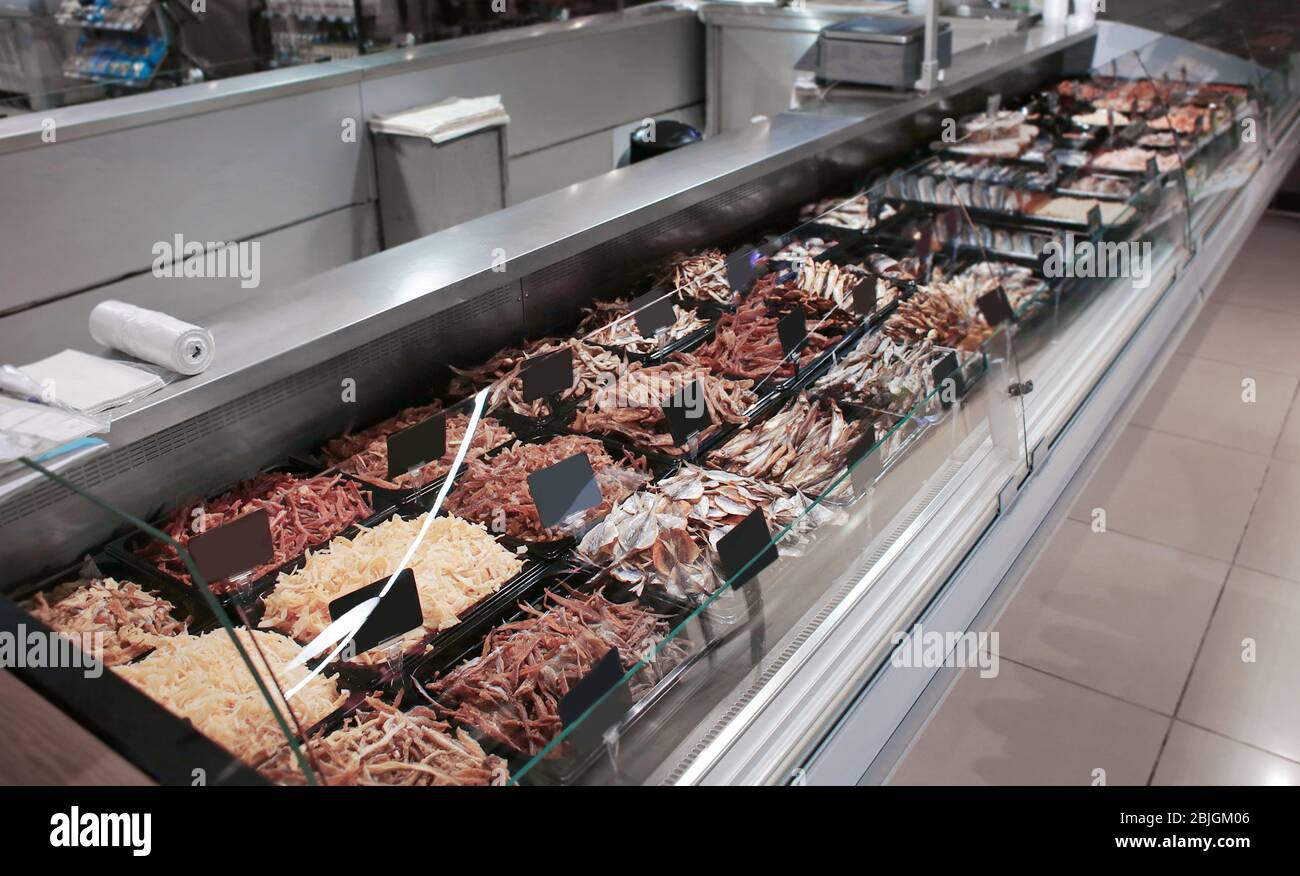 Smoked seafood in fish supermarket Stock Photo - Alamy