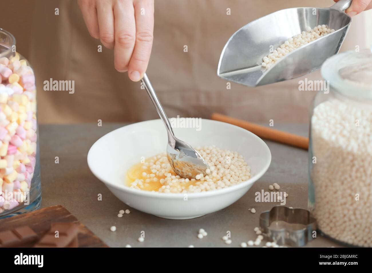 Adding puffed rice hi-res stock photography and images - Alamy