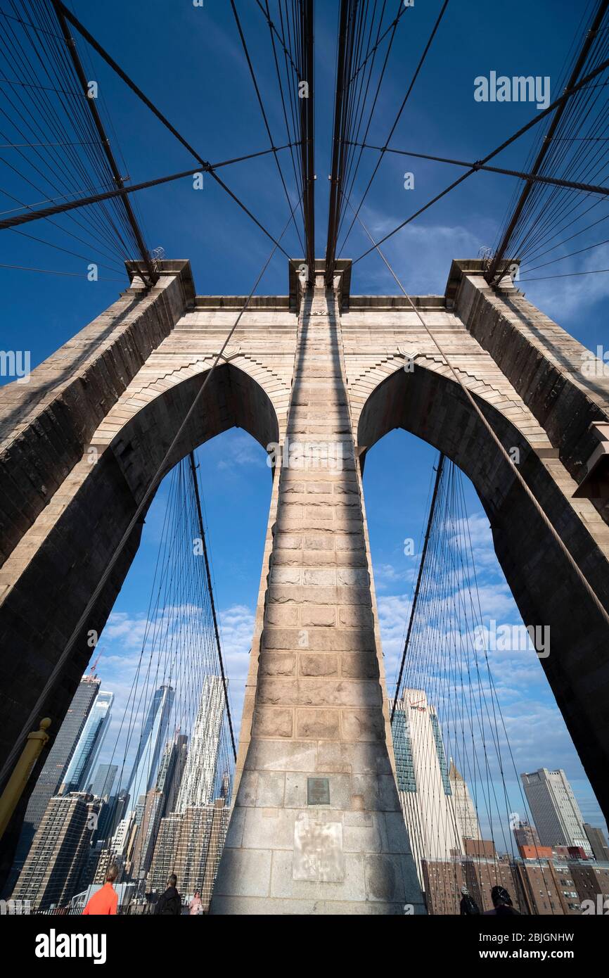 Wide angle abstract views looking up at the gothic arched tower holding ...