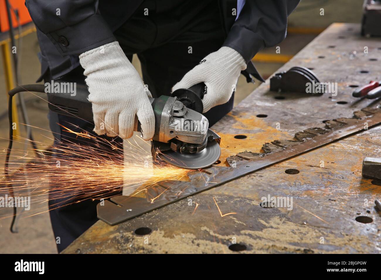 Man with angle grinder hi-res stock photography and images - Alamy