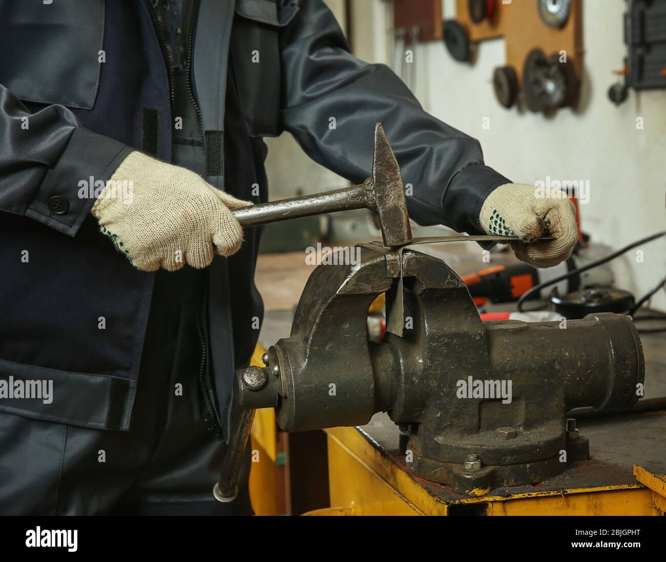 Man using grip hammer hi-res stock photography and images - Alamy