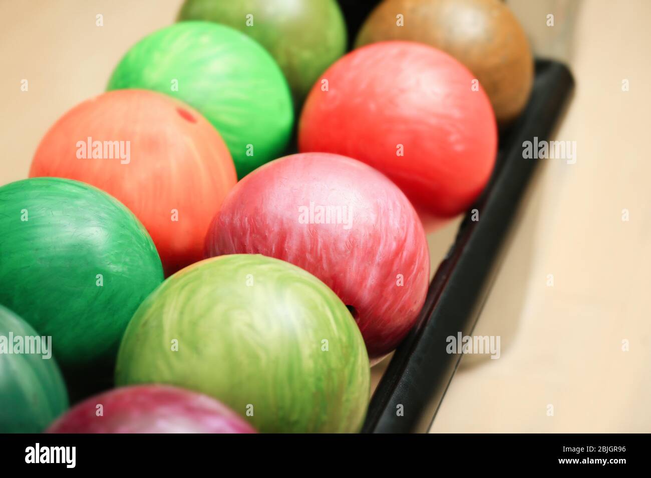 Bowling balls in rack hi-res stock photography and images - Alamy