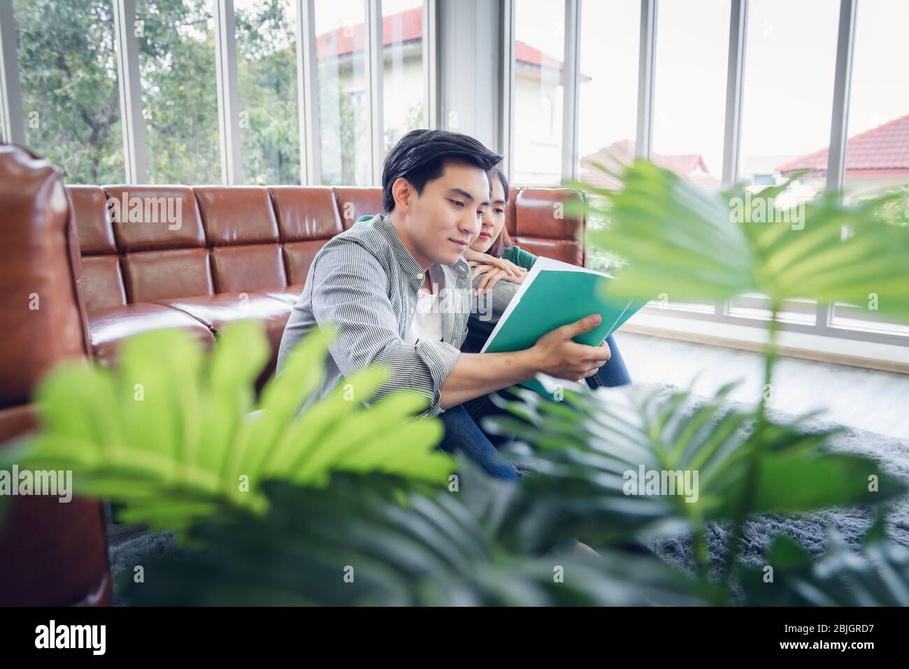 Woman reading romantic book indoor hi-res stock photography and images ...