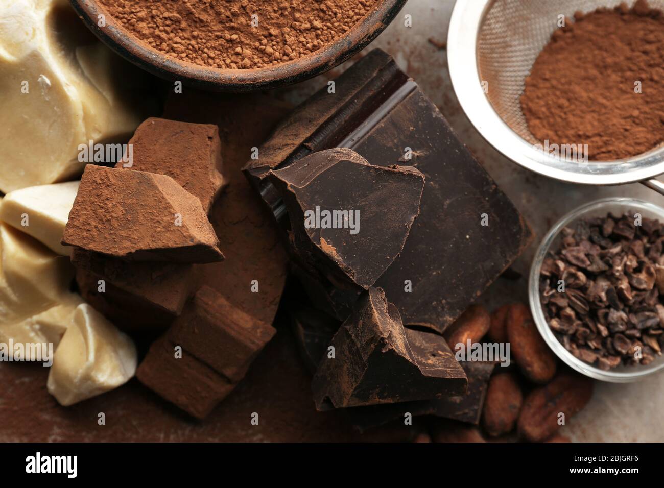 Composition of cocoa products on table Stock Photo - Alamy