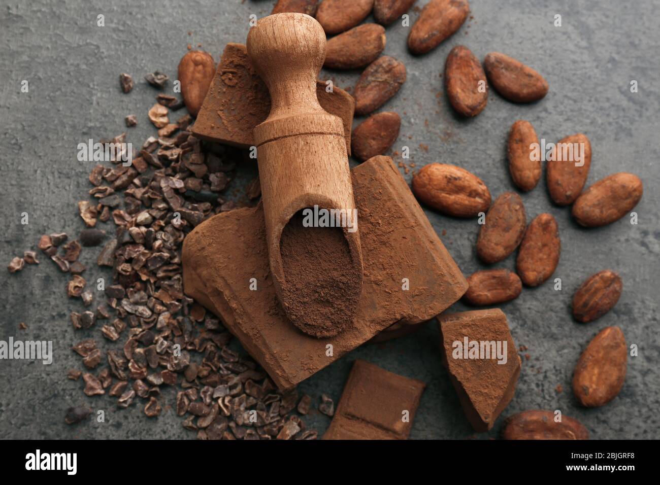 Composition of cocoa products on table Stock Photo - Alamy
