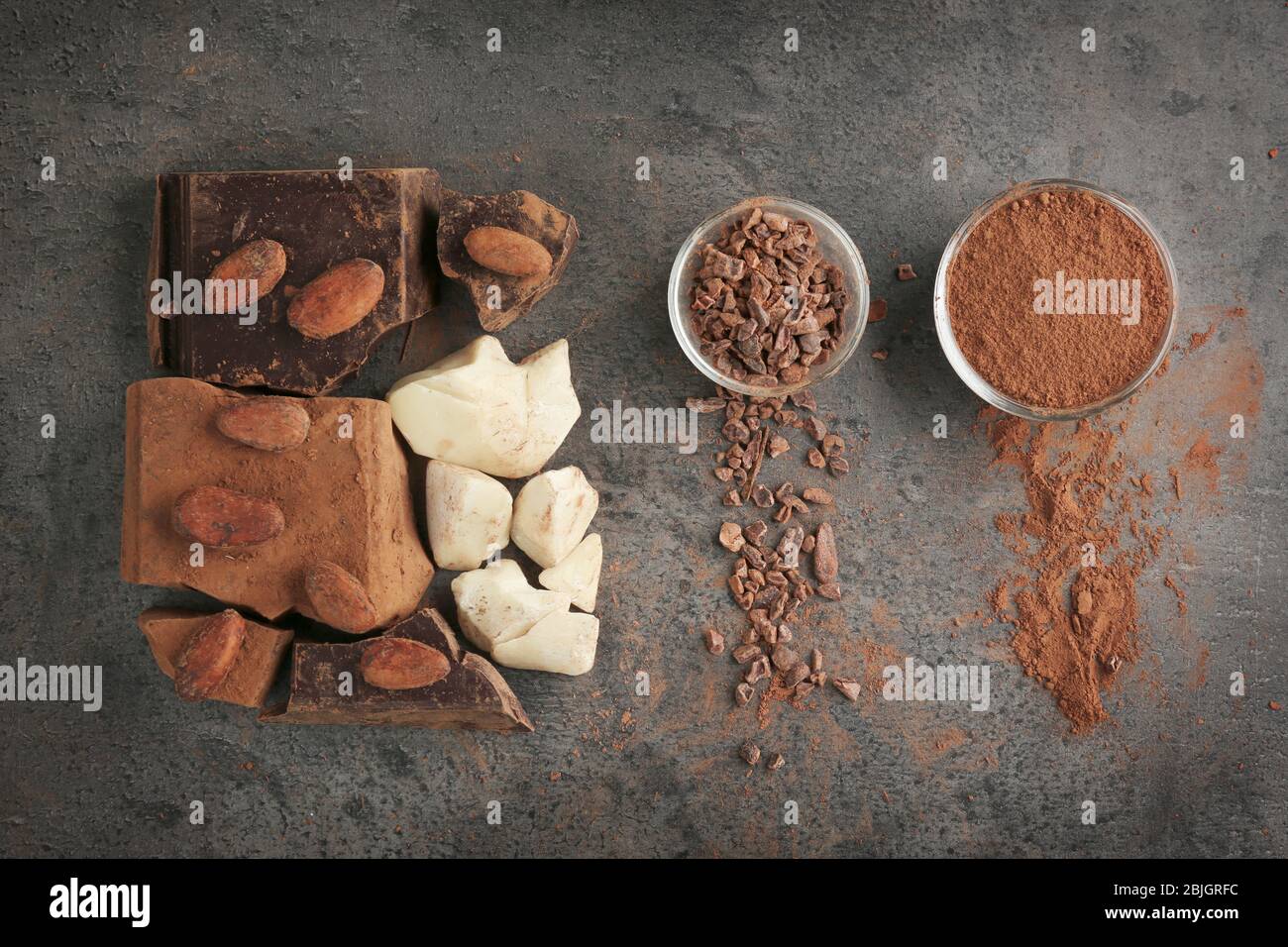 Composition of cocoa products on table Stock Photo - Alamy