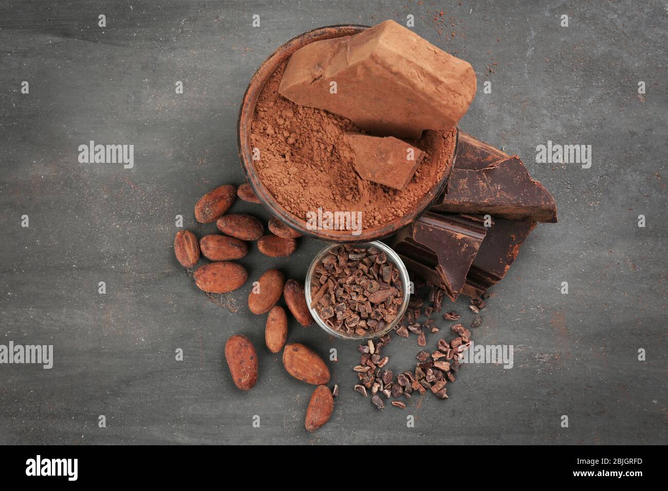 Composition of cocoa products on table Stock Photo - Alamy