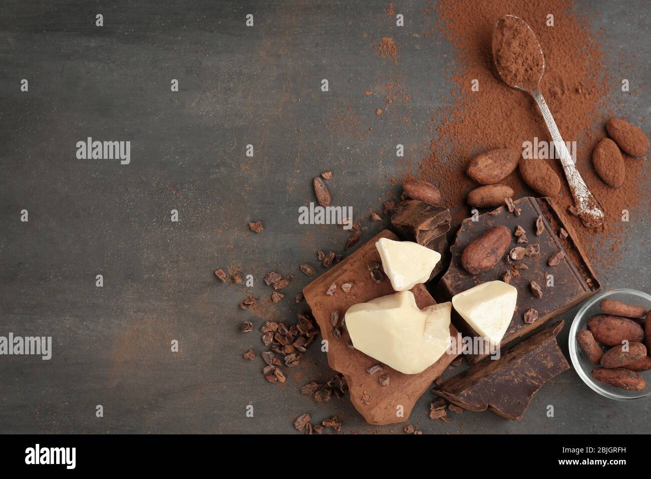 Composition of cocoa products on table Stock Photo - Alamy