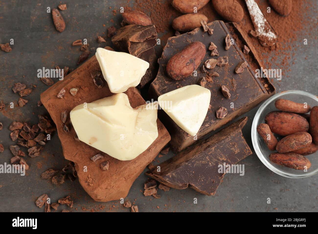 Composition of cocoa products on table Stock Photo - Alamy