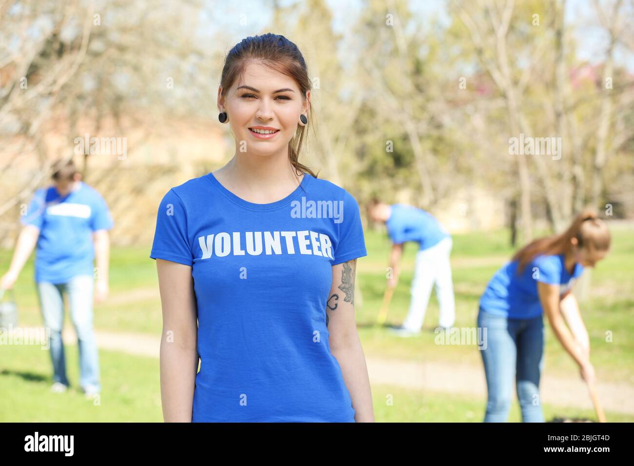 Beautiful young volunteer team hi-res stock photography and images - Alamy