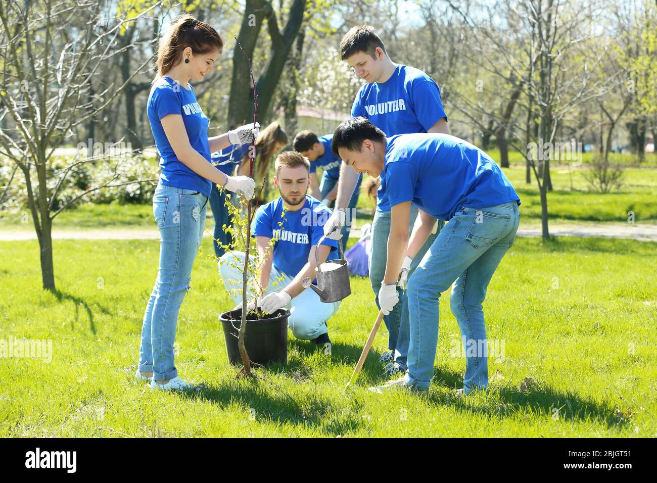 Young asian female volunteer sitting hi-res stock photography and images - Alamy