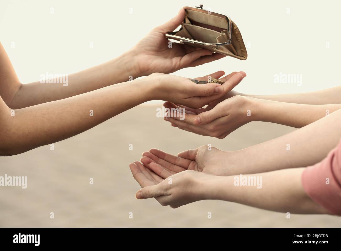 Woman giving sharing donation hi-res stock photography and images - Alamy