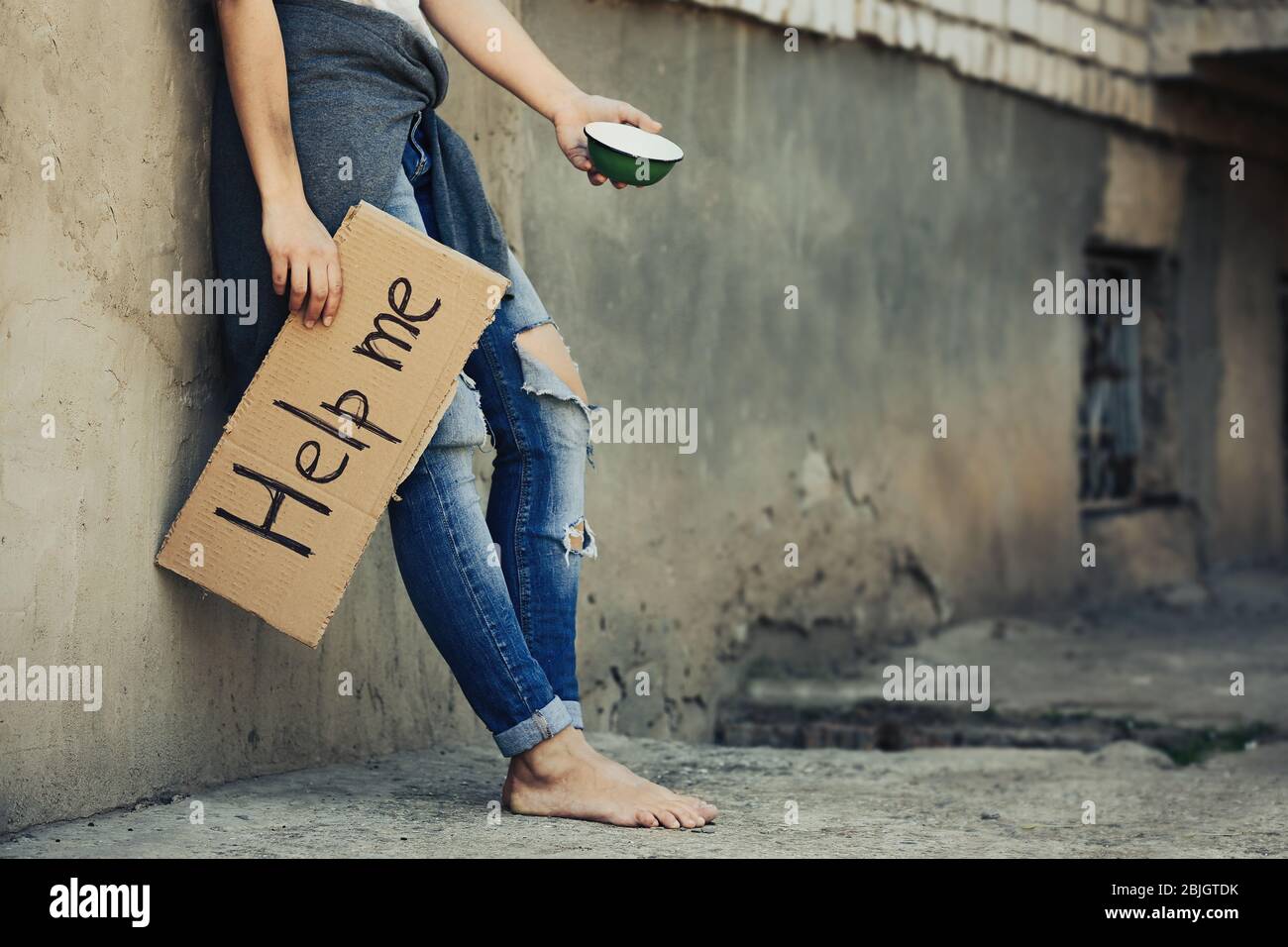 Begging bowl hands hi-res stock photography and images - Alamy