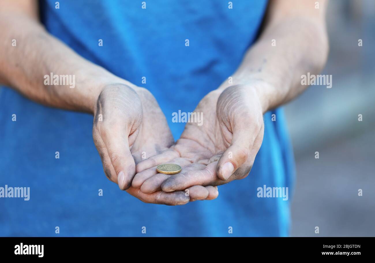 Poor man begging for money Stock Photo - Alamy