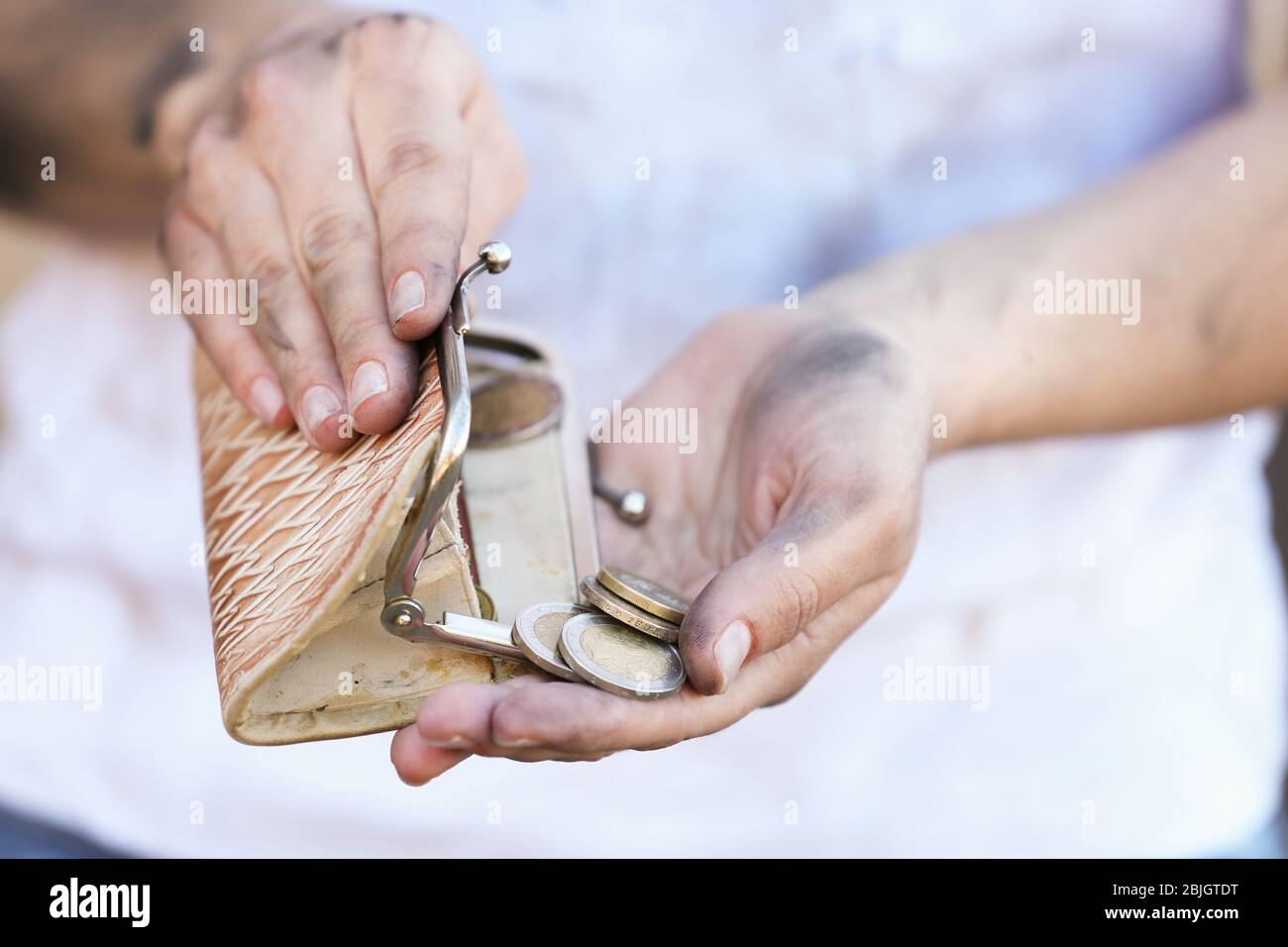 Poor woman counting money hi-res stock photography and images - Alamy