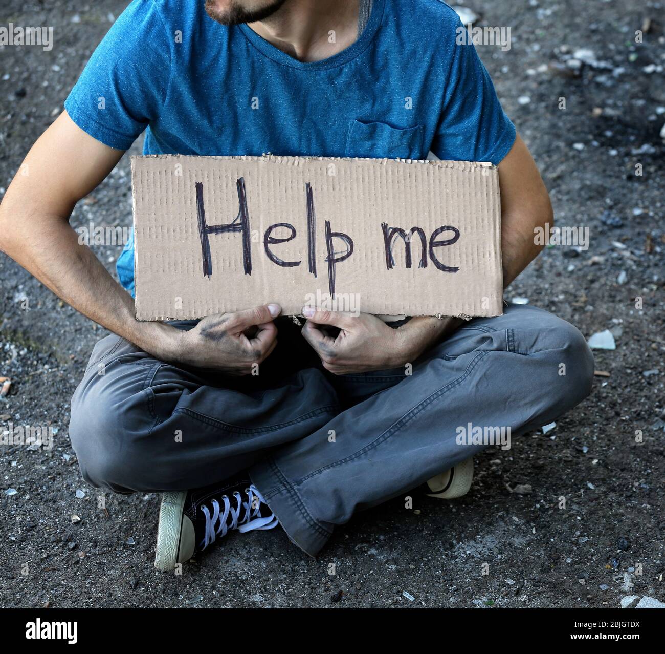 Man begging for help on the street Stock Photo - Alamy