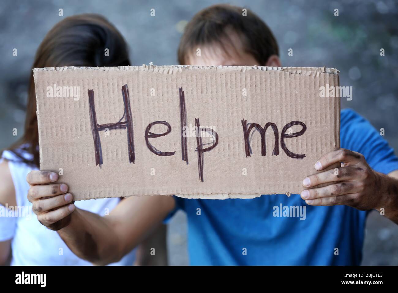People begging hi-res stock photography and images - Alamy