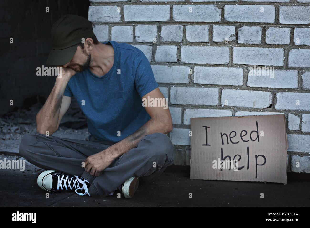 Man begging for help hi-res stock photography and images - Alamy