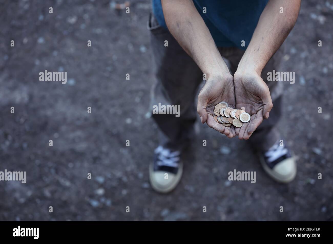 Homeless man begging coins money hi-res stock photography and images ...