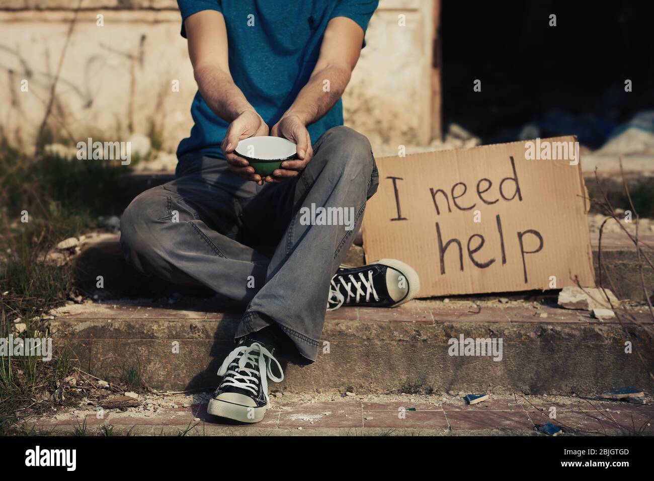 Man begging for help on the street Stock Photo - Alamy