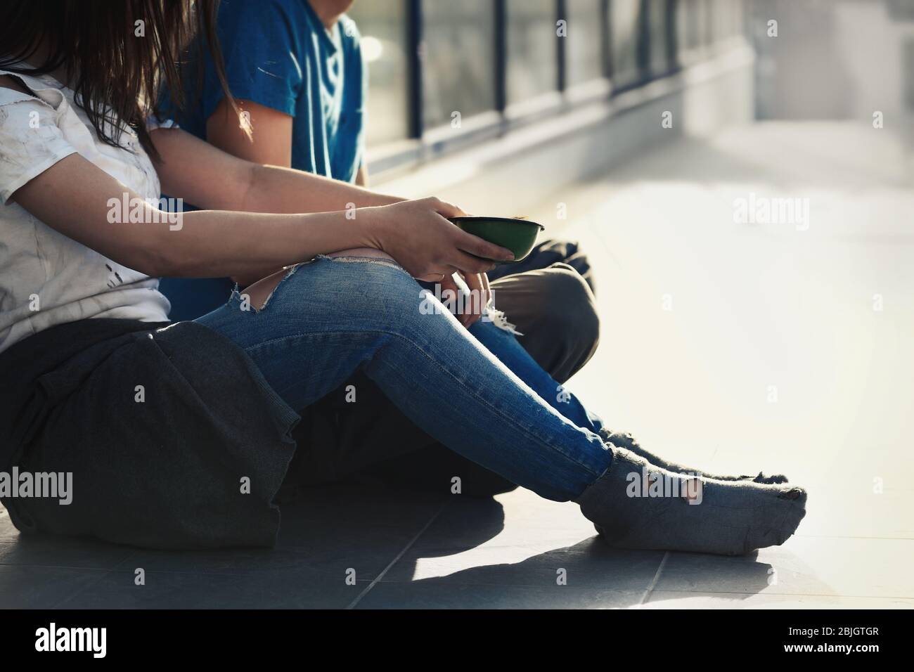 Begging bowl hands hi-res stock photography and images - Alamy