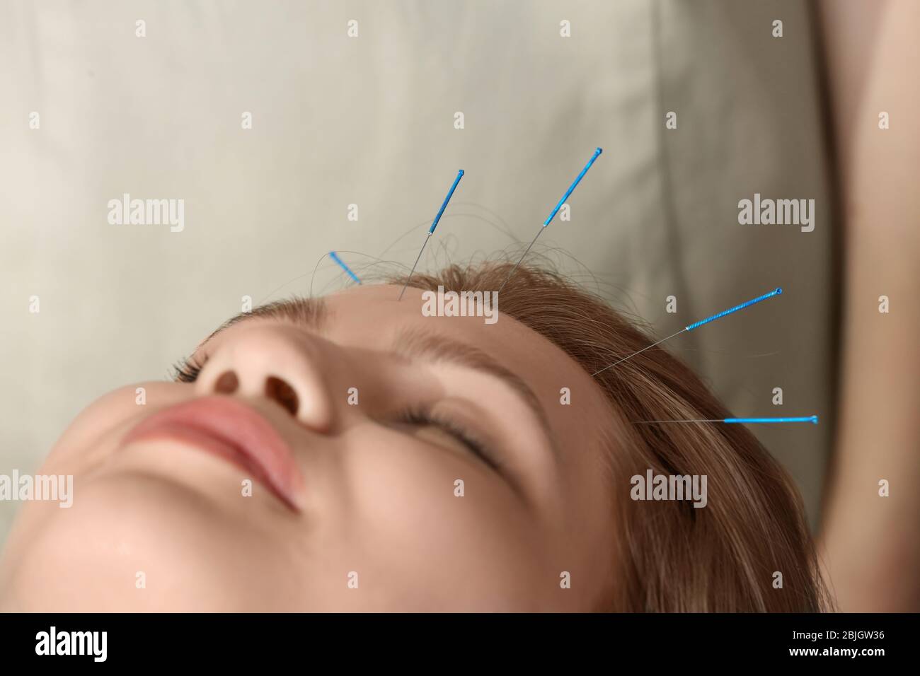 Woman acupressure forehead hi-res stock photography and images - Alamy
