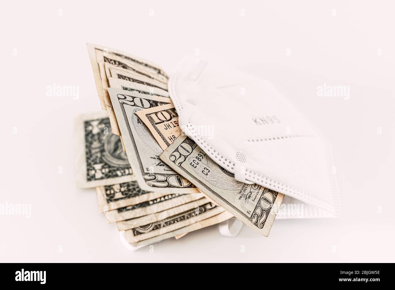 The business of selling face masks nk95, dollar bills inside face mask ...