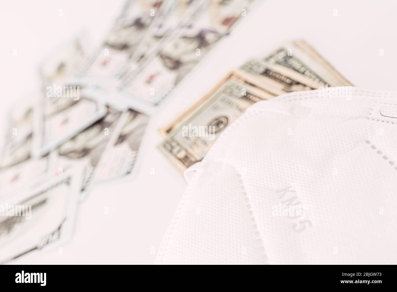 The business of selling face masks nk95, dollar bills inside face mask ...