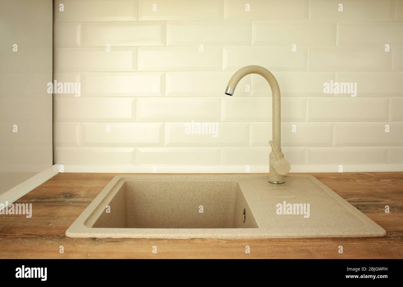 Kitchen sink in modern interior Stock Photo - Alamy