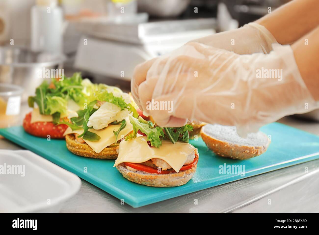 Female chef cooking sandwiches hi-res stock photography and images - Alamy