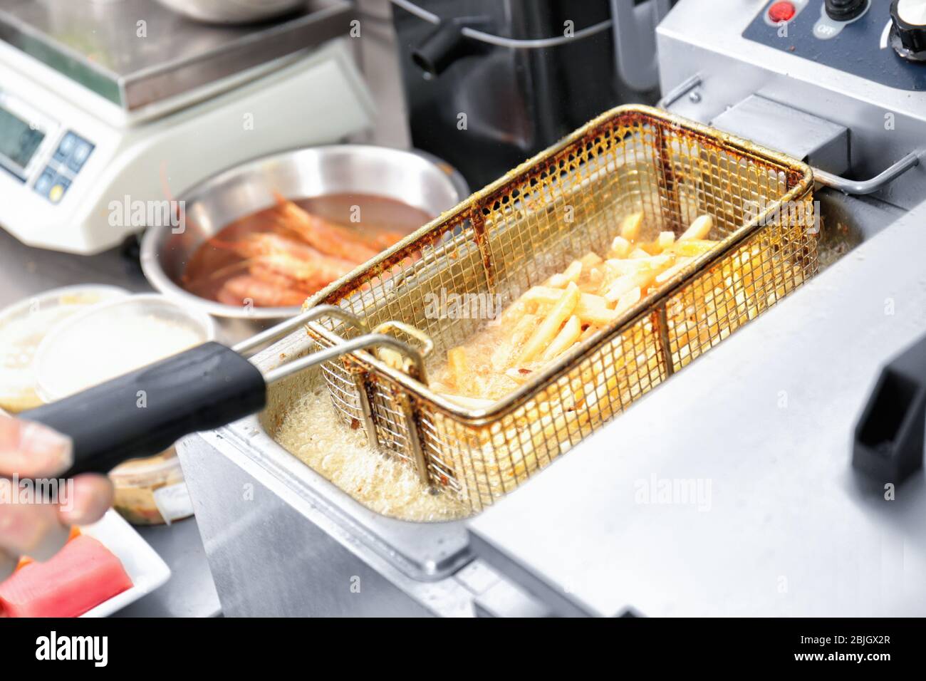 Preparing french fries hi-res stock photography and images - Alamy
