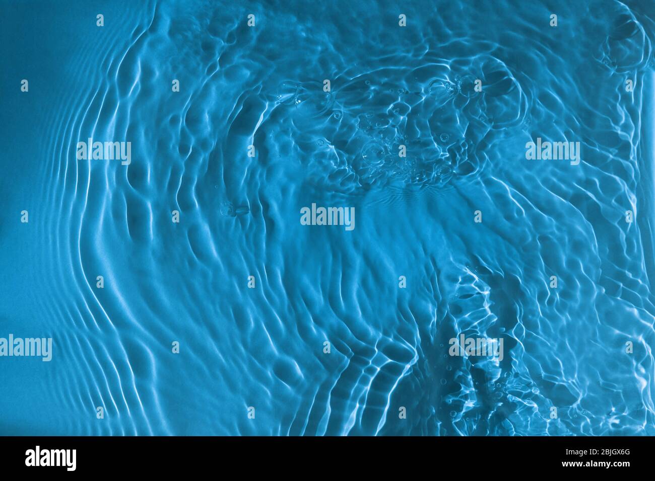 Abstract blue background of waves and ripples on the water Stock Photo ...
