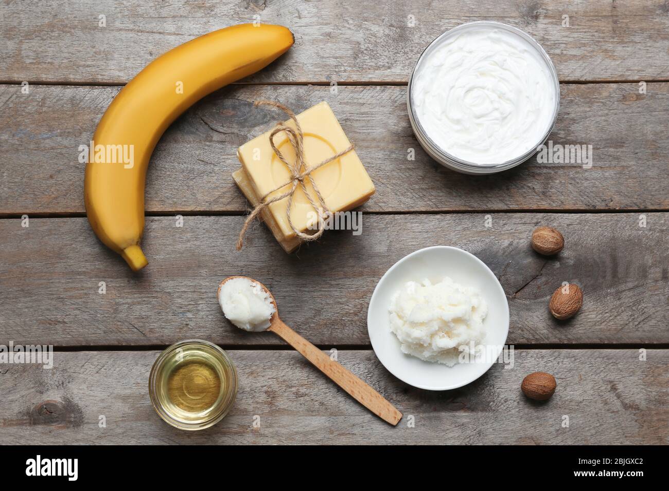 Beautiful composition with shea butter in jar on table Stock Photo - Alamy