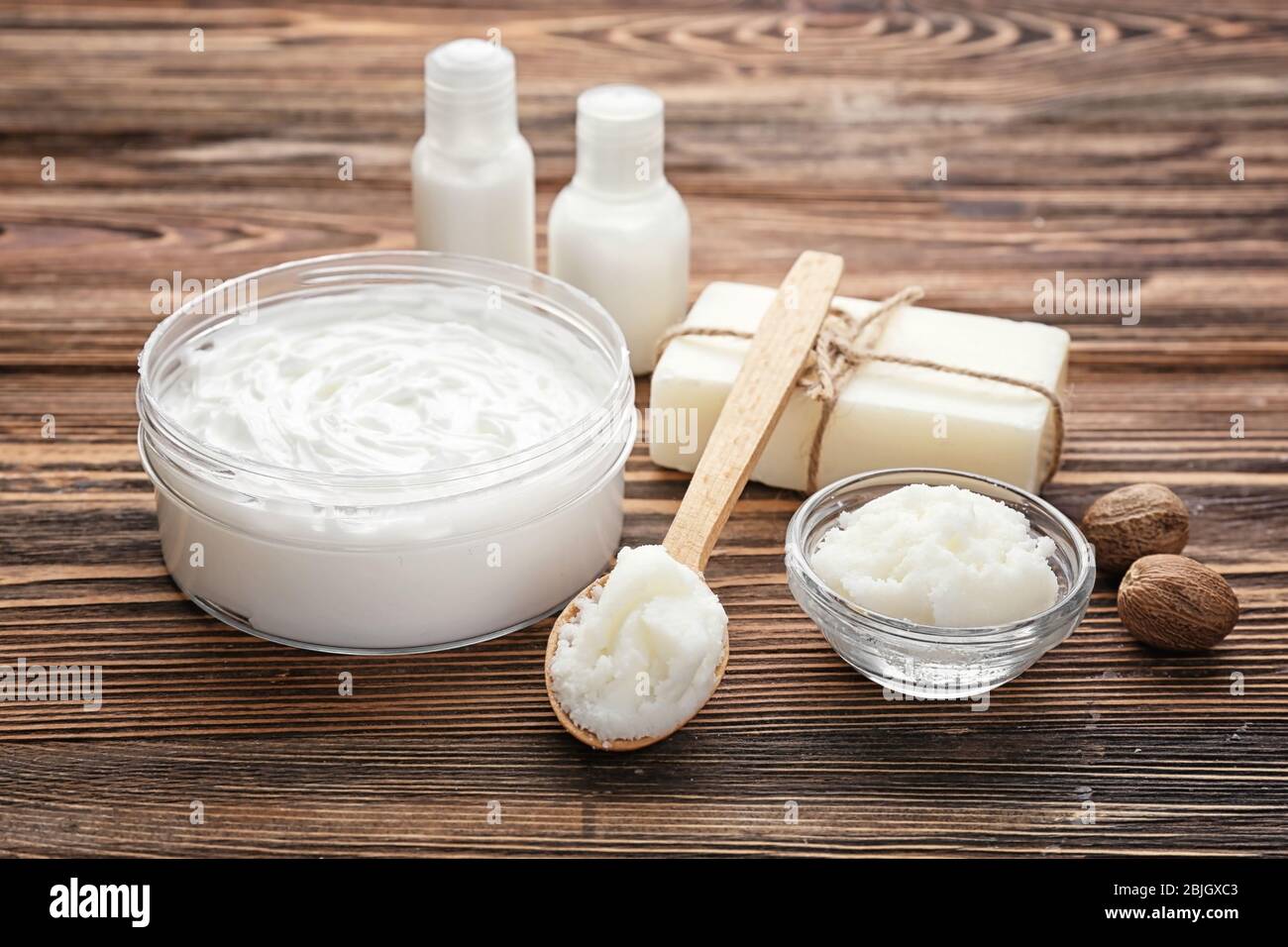 Beautiful composition with shea butter in jar on table Stock Photo - Alamy