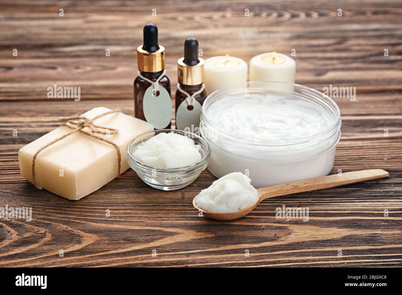 Beautiful composition with shea butter in jar on table Stock Photo - Alamy