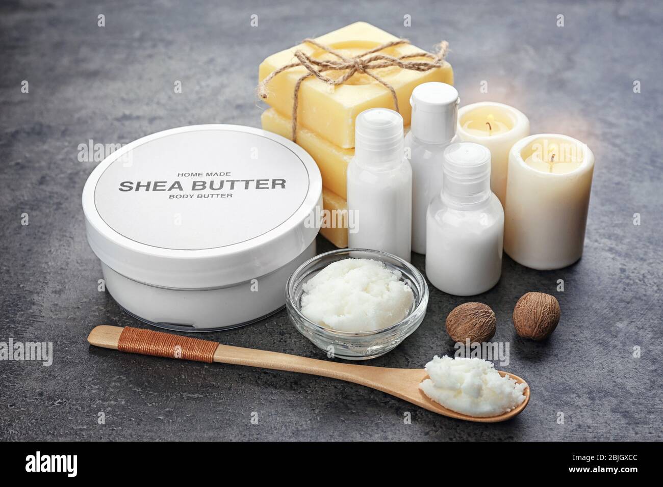 Beautiful composition with shea butter in jar on table Stock Photo - Alamy