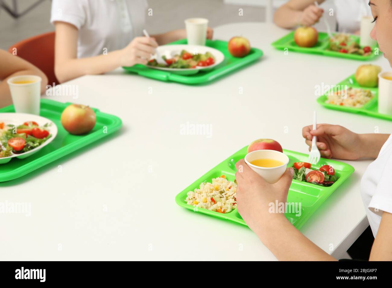 School lunch room table hi-res stock photography and images - Alamy