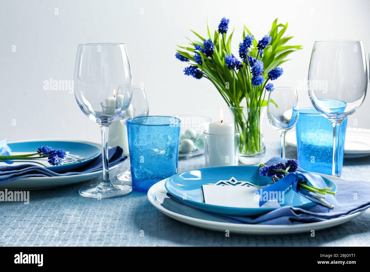 Beautiful table setting with floral decor Stock Photo - Alamy