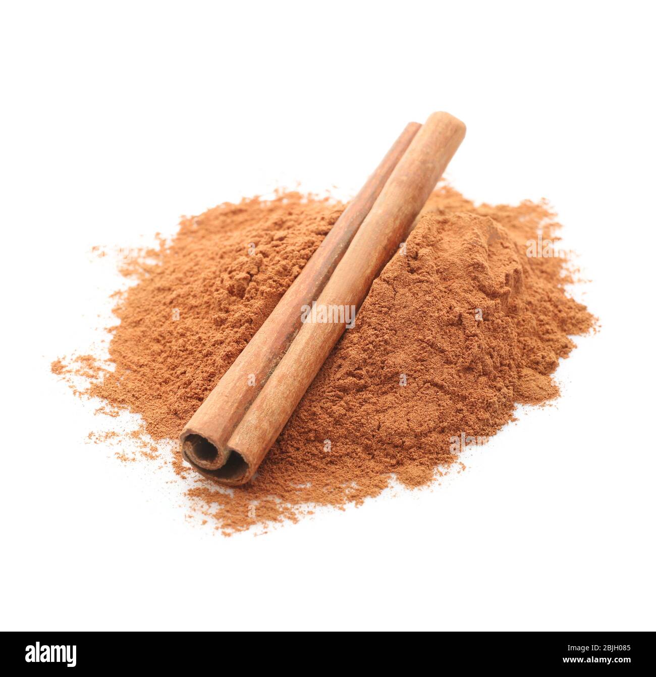 Cinnamon stick and powder isolated on white Stock Photo - Alamy