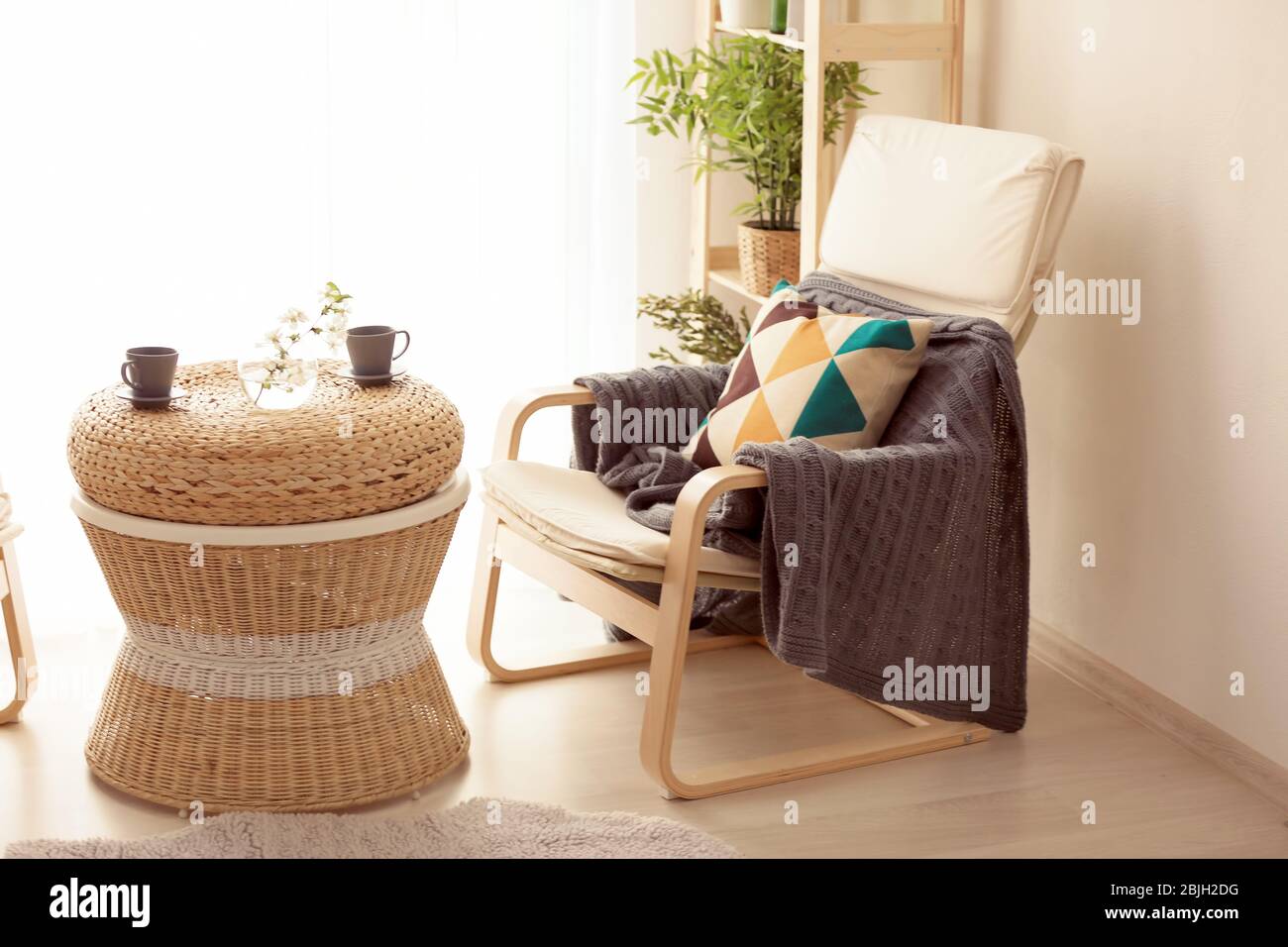 Beautiful modern veranda with cozy armchair and coffee table Stock ...
