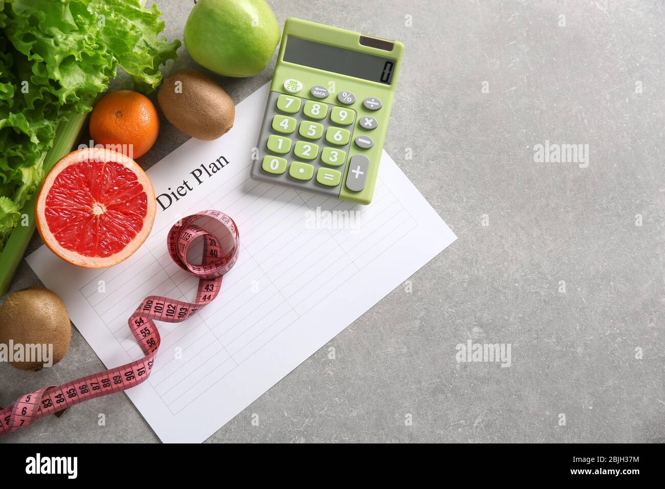 Diet plan and healthy foods on light background Stock Photo - Alamy